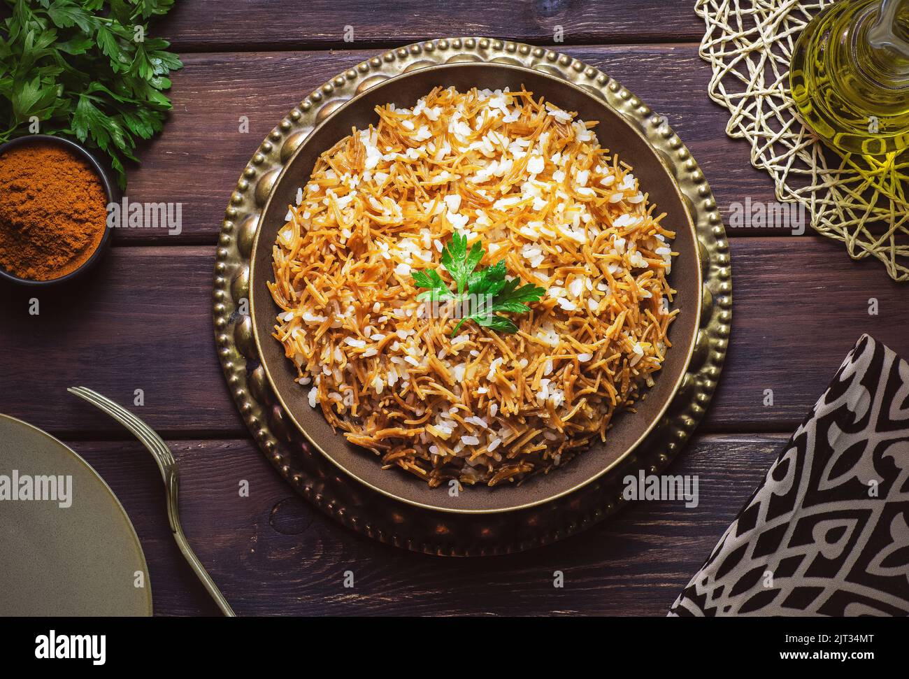 Arabic cuisine; Egyptian oriental dish "Rice with vermicelli" placed on ...