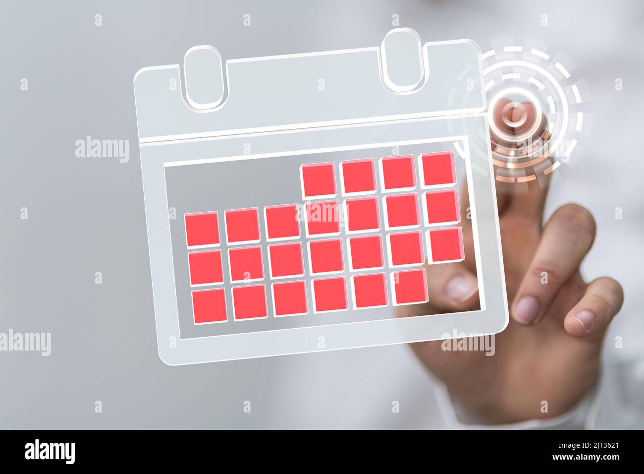 A human hand touching a calendar icon with a blurred background Stock ...