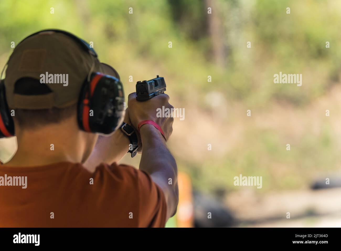 Man holding shooting target hi-res stock photography and images - Alamy