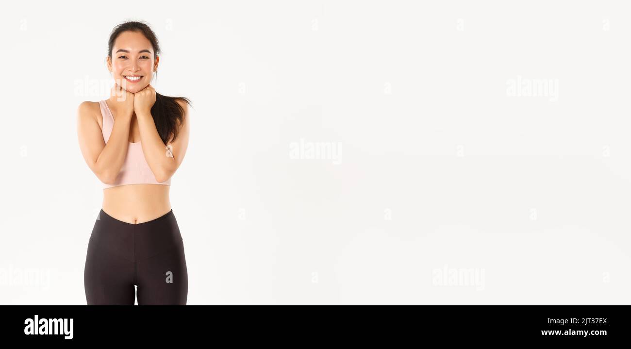 Sport, wellbeing and active lifestyle concept. Excited and happy asian ...