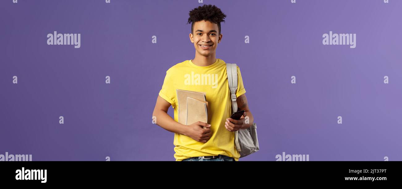 Back to school, university concept. Portrait of young cheerful male ...