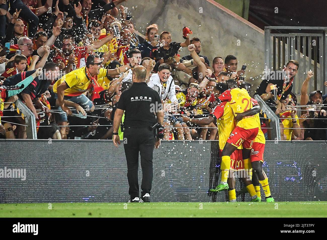 Lois OPENDA of Lens celebrate his goal with teammates and supporters ...