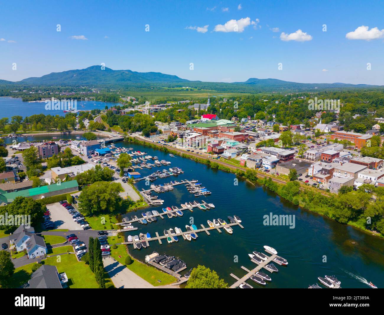 Magog city aerial view at the mouth of Magog River to Lake Memphremagog ...