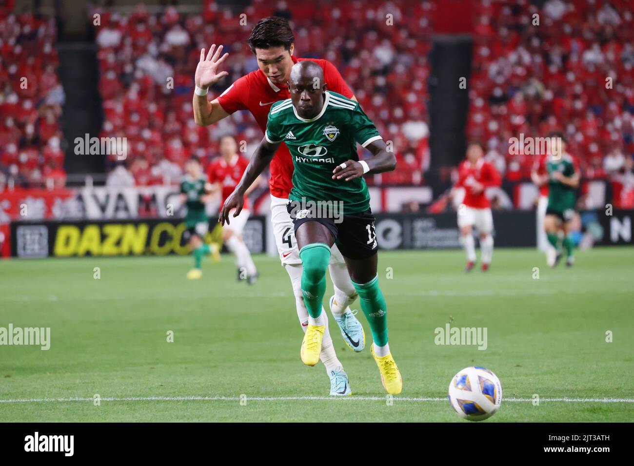 Saitama, Japan. 25th Aug, 2022. (L to R) Takuya Iwanami (Reds), Modou ...