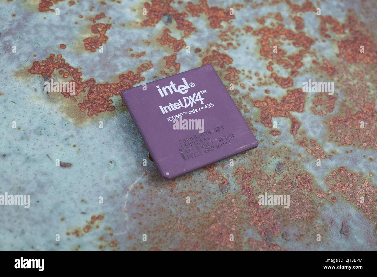 KYIV, UKRAINE - April 22, 2020. Intel 486DX4 processor on rusty metal ...