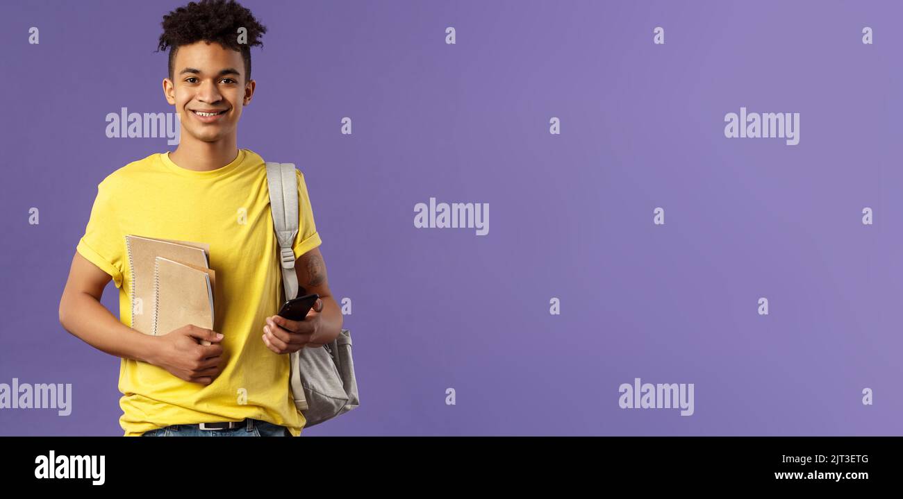 Back to school, university concept. Portrait of young cheerful male ...