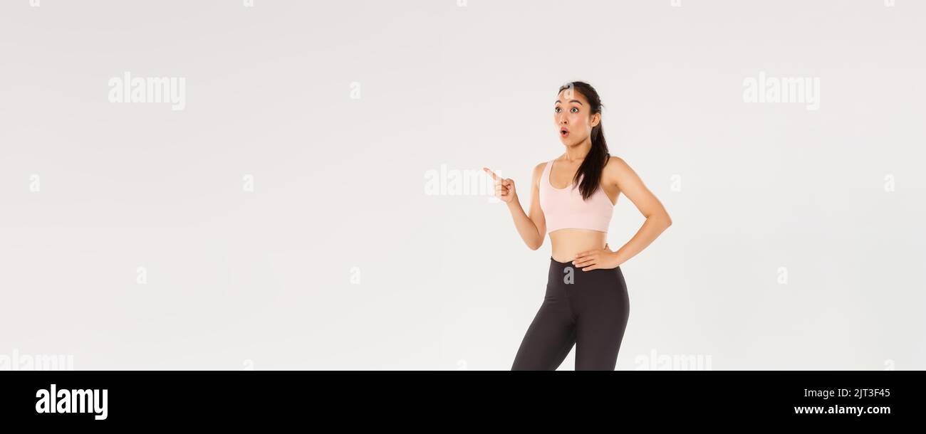 Sport and gym concept. Full length of amazed and surprised cute asian ...