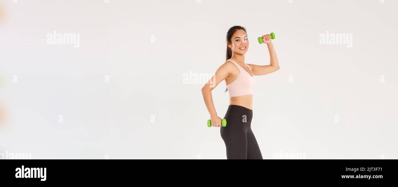 Sport, gym and healthy body concept. Full length of smiling female ...