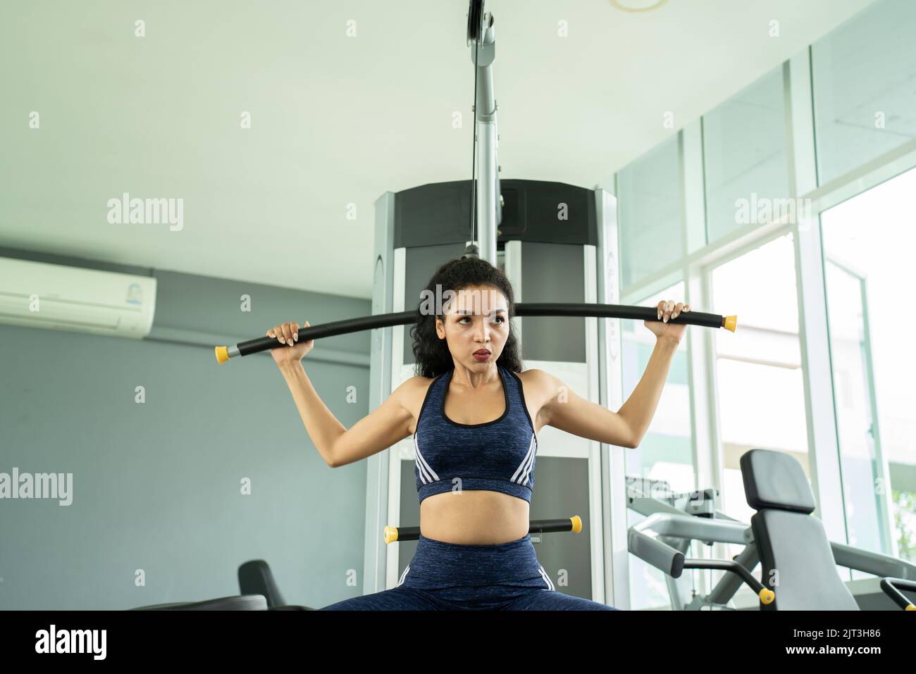 beautiful muscular fit woman exercising building muscles. Muscular ...