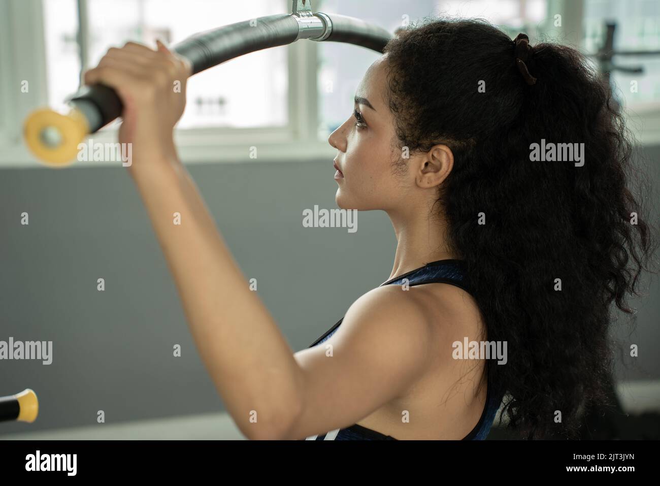 beautiful muscular fit woman exercising building muscles. Muscular ...
