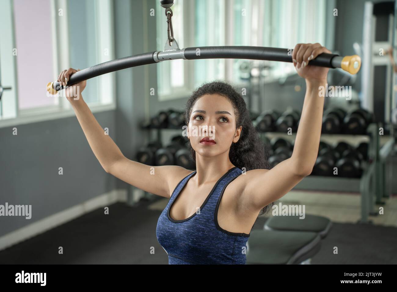 beautiful muscular fit woman exercising building muscles. Muscular ...