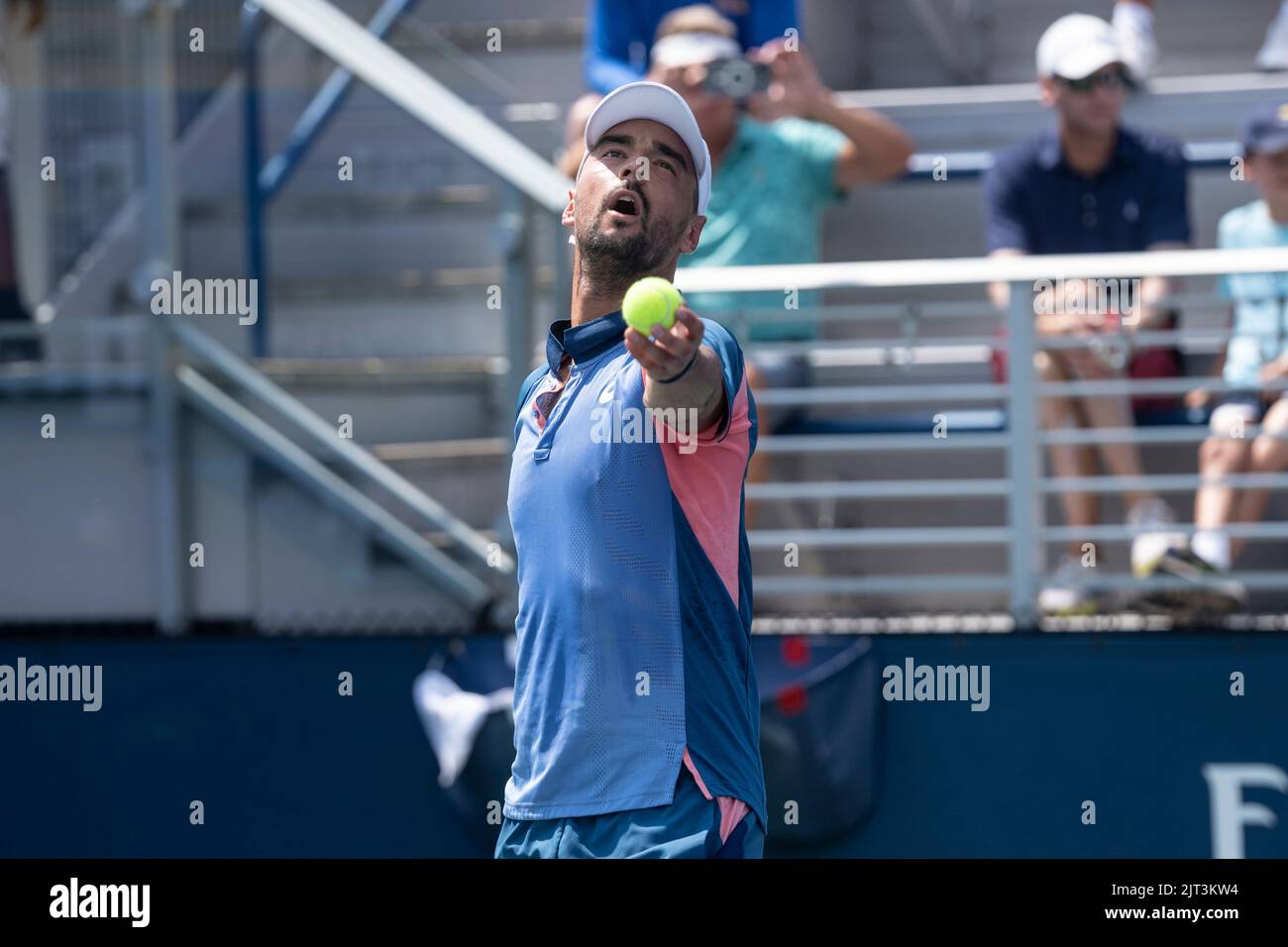 New York, NY - August 26, 2022: Dimitar Kuzmanov of Bulgaria serves ...