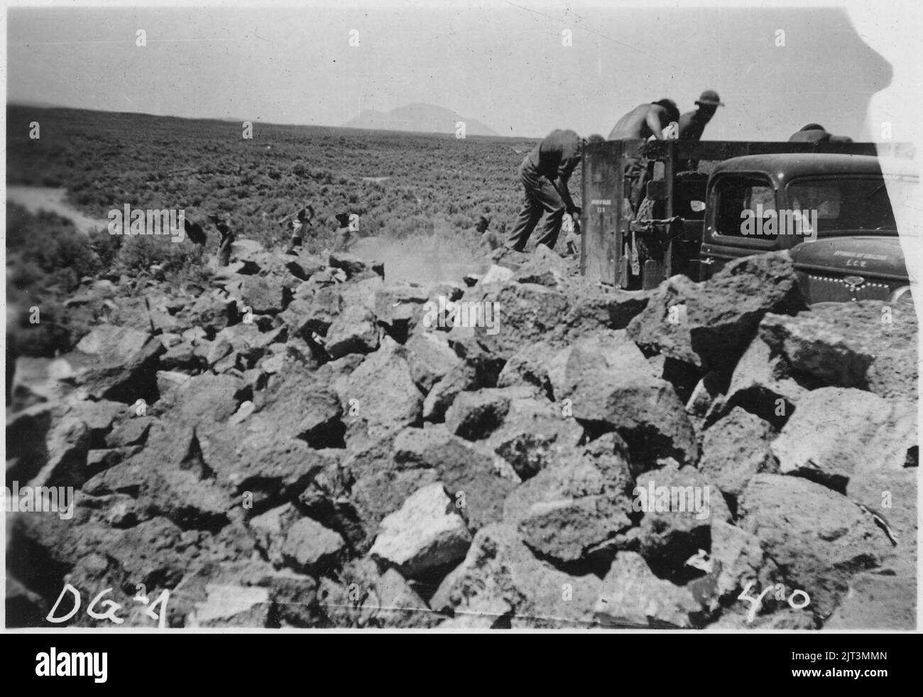 Truck trails. Excavation of a cut has just been completed. The truck ...