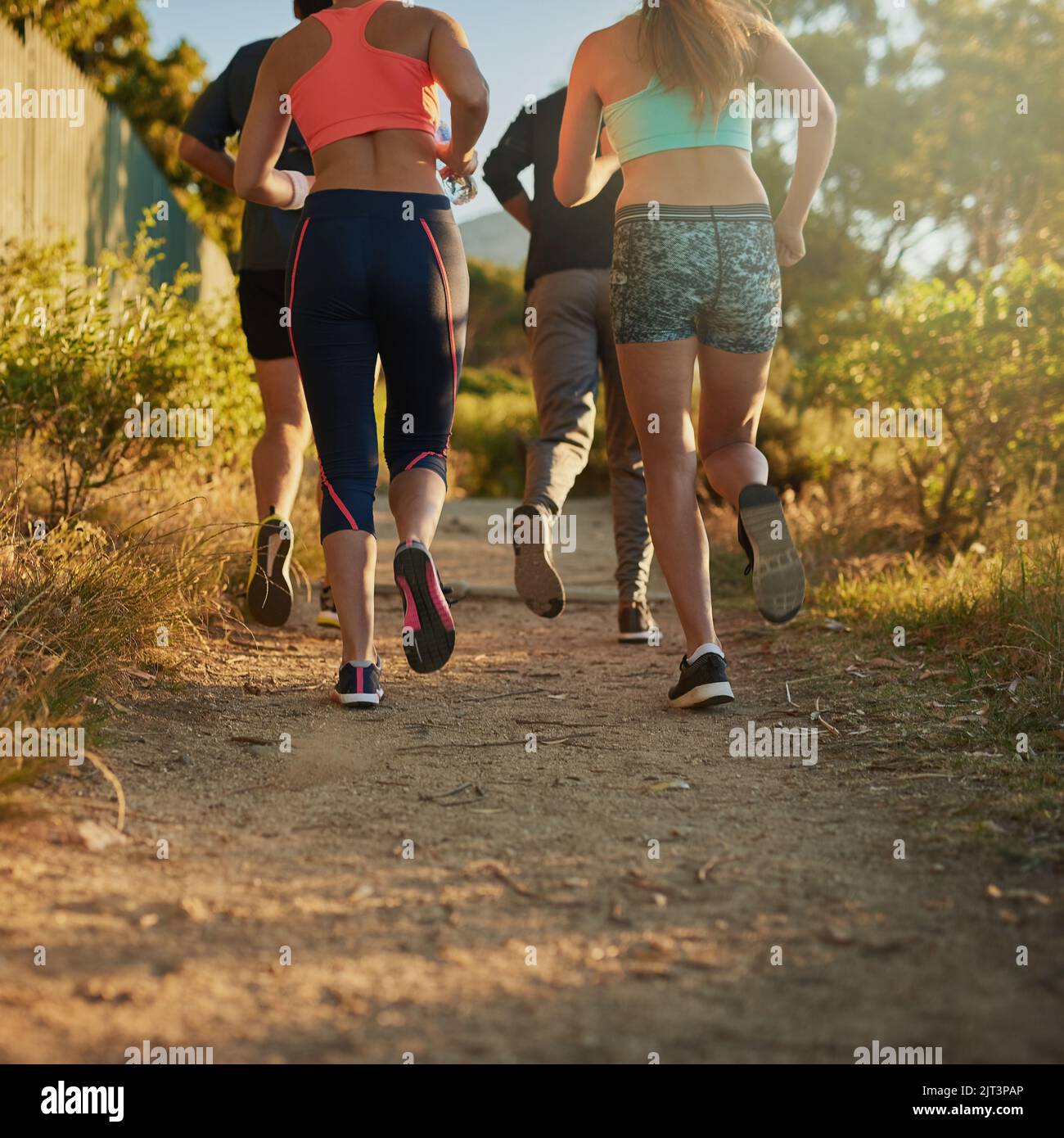 Workout pals give you the boost you need. a fitness group out running ...