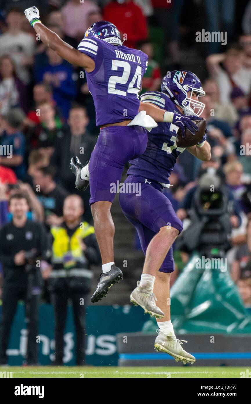 Rod Heard II of Northwestern celebrates during the Aer Lingus College ...