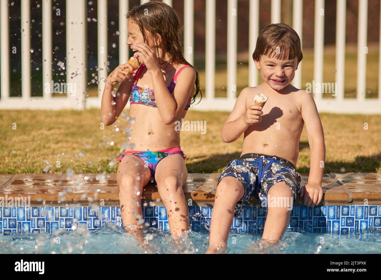 Nothing says summer like swimming pool fun. a happy brother and sister ... Nothing says summer like swimming pool fun. a happy brother and sister ...