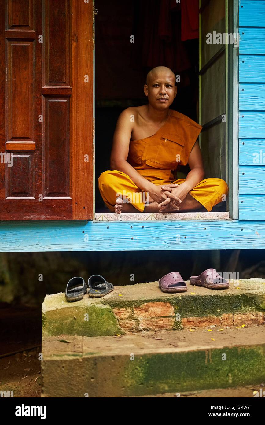 With our thoughts we make the world. Portrait of a buddhist monk ...