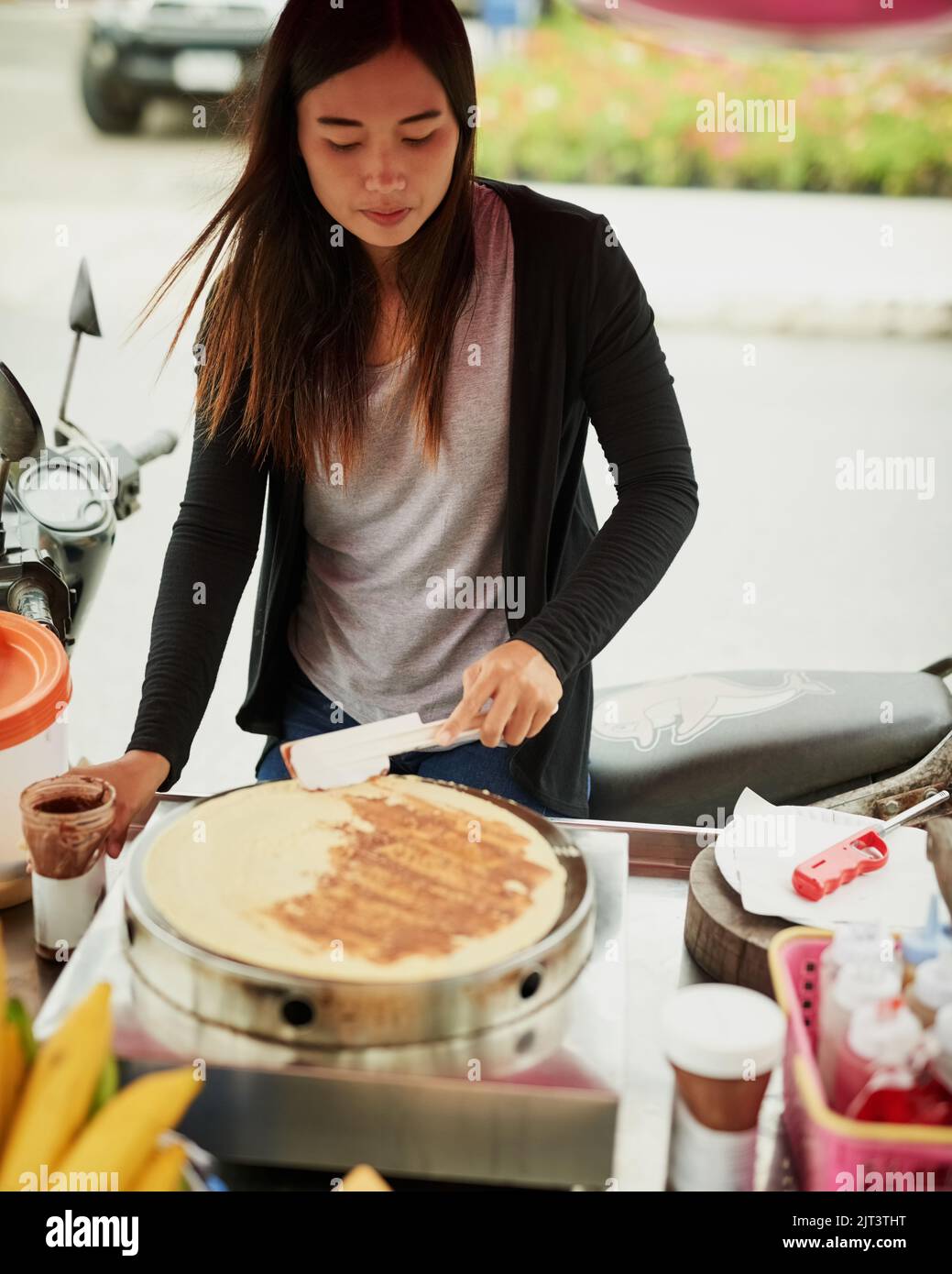 Now that looks delicious. a food vendor in Thailand preparing a tasty ...