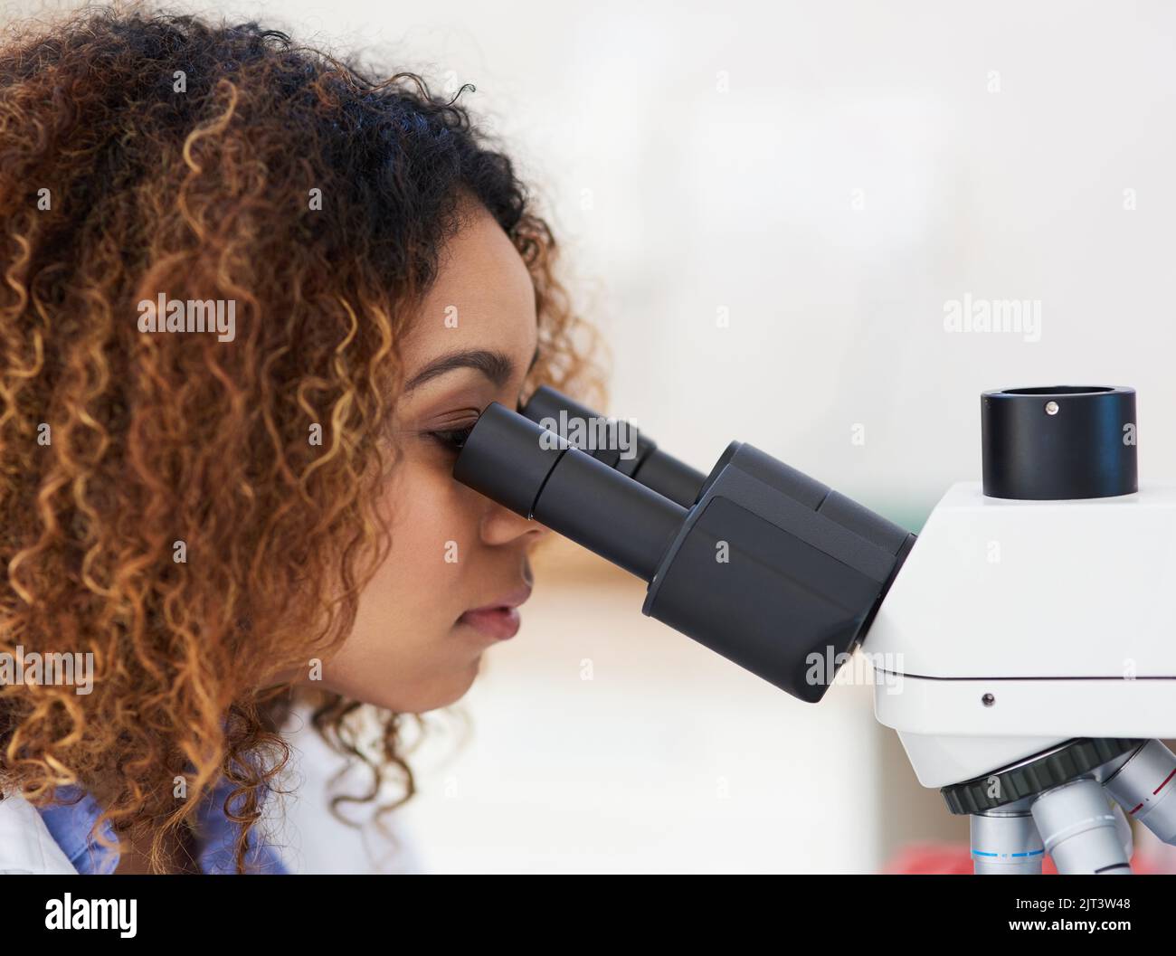 When things are too small for the human eye...a young female scientist ...