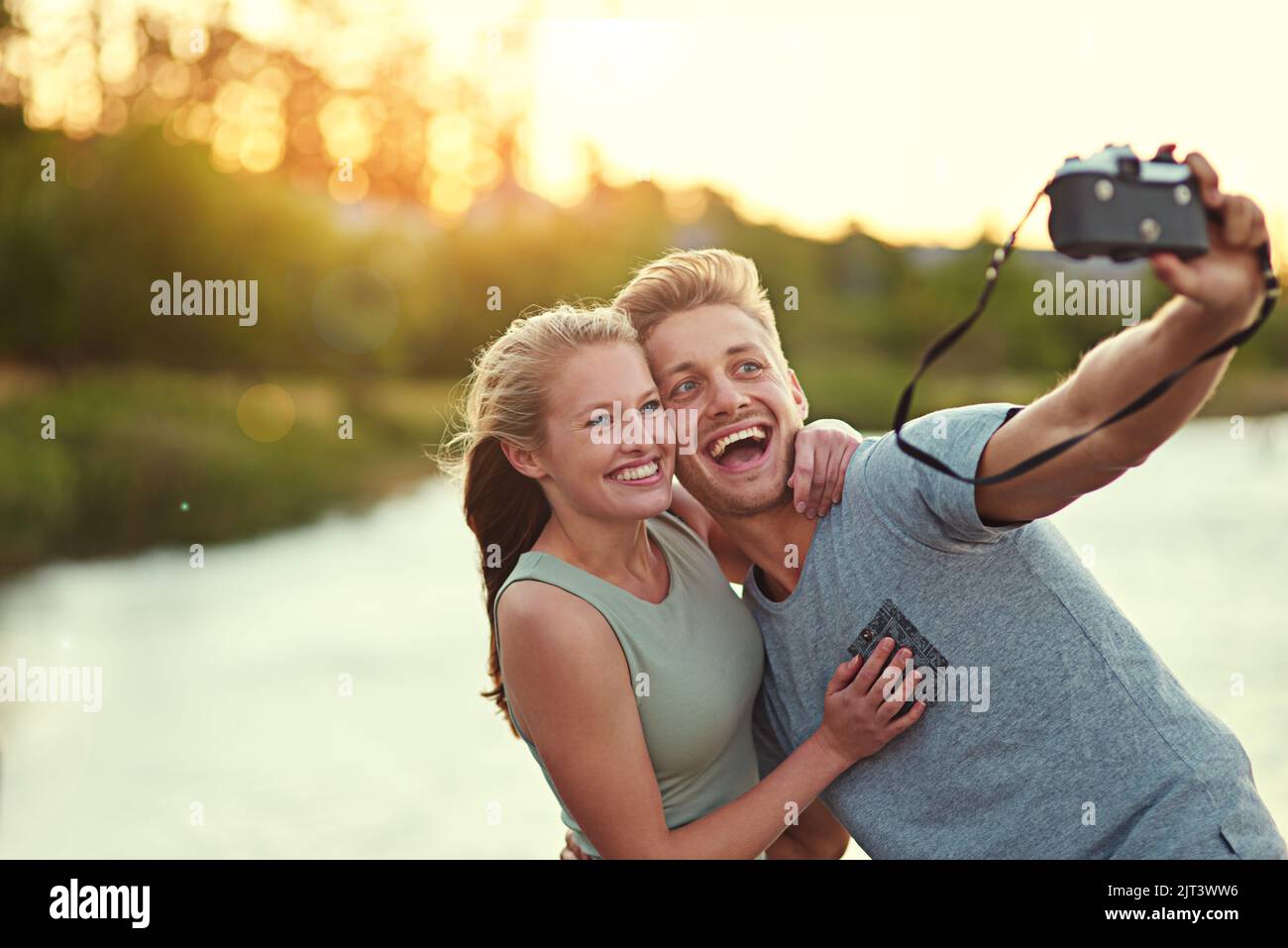 Capturing some good times together. a young couple taking a selfie ...