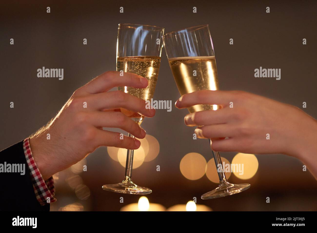 Theres always a reason to celebrate. a young couple making a toast ...
