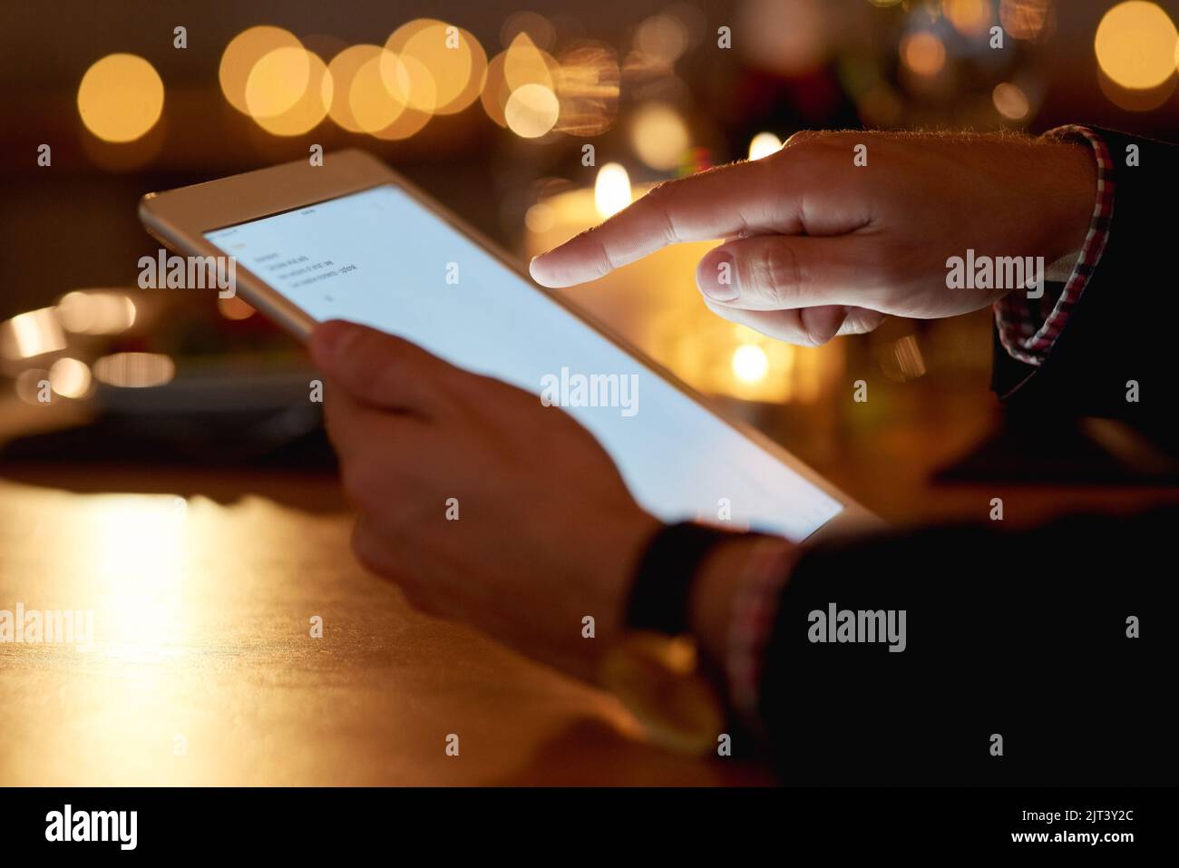 Tap to connect. an unrecognizable businessman using a digital tablet ...