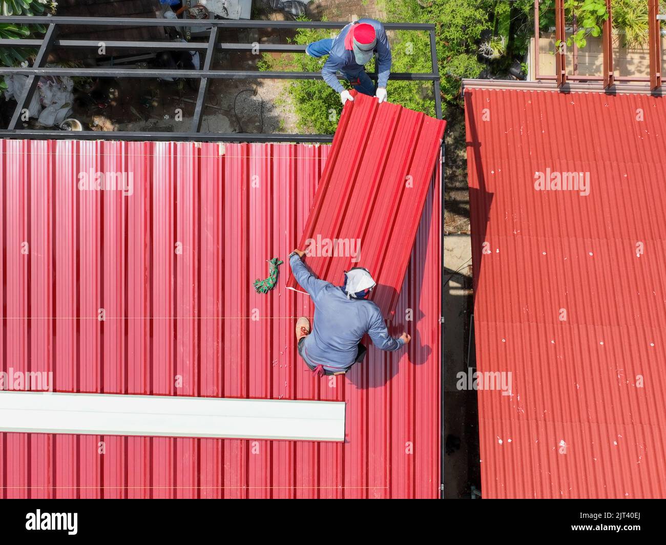 Unsafe construction of workers while construction worker install new ...