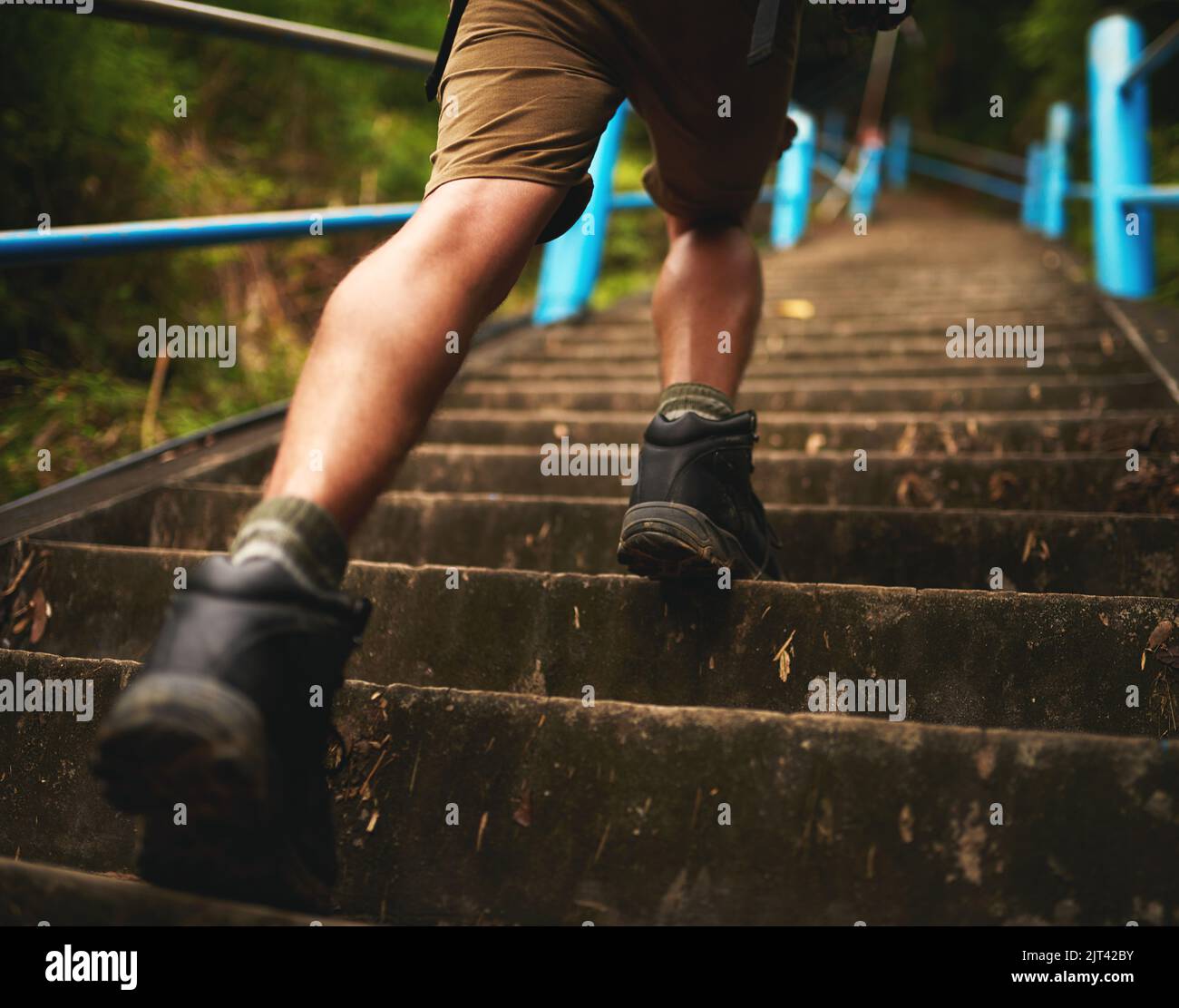 Man climbing stairs hi-res stock photography and images - Alamy