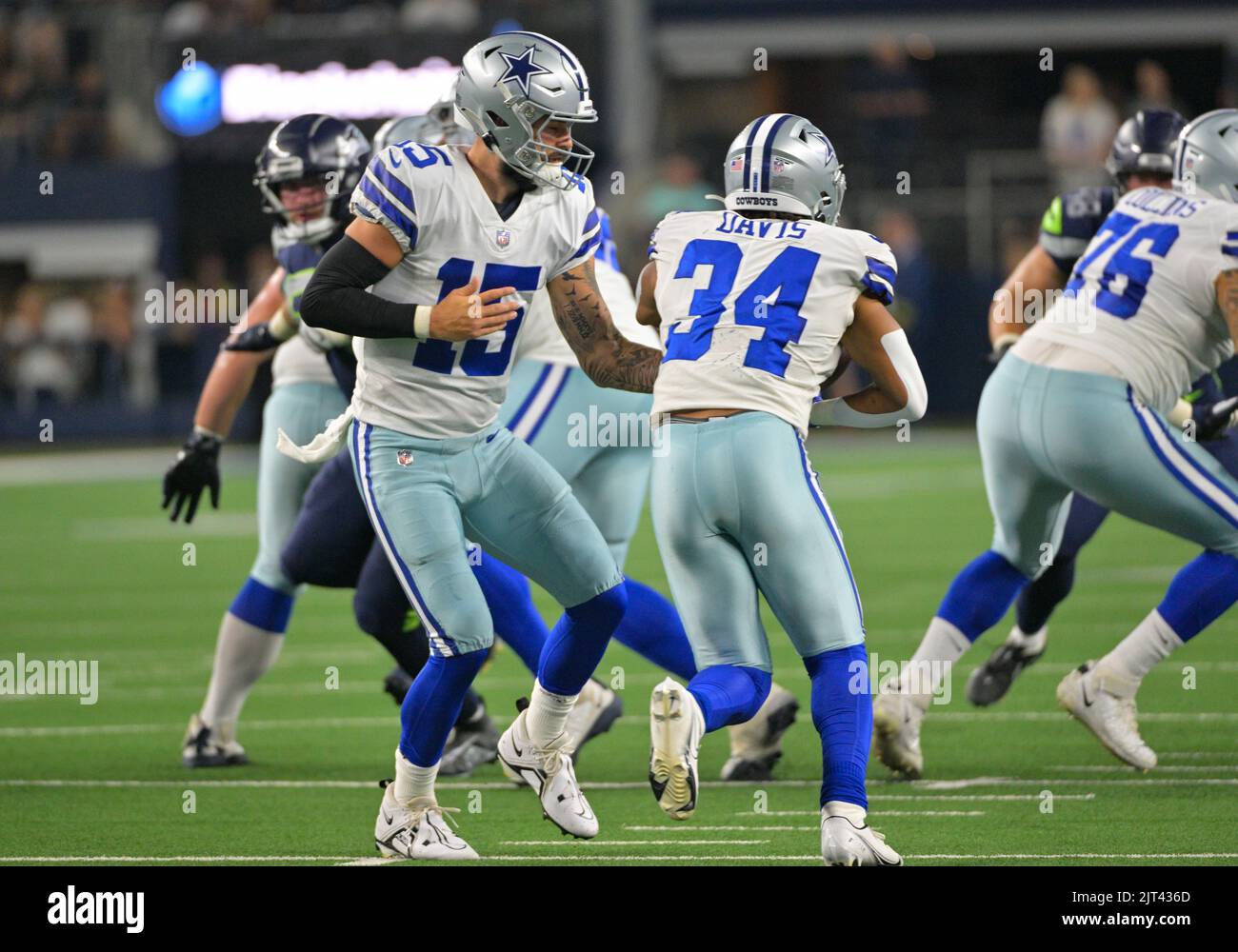 August 26 2022: Dallas Cowboys quarterback Will Grier (15) hand the ...