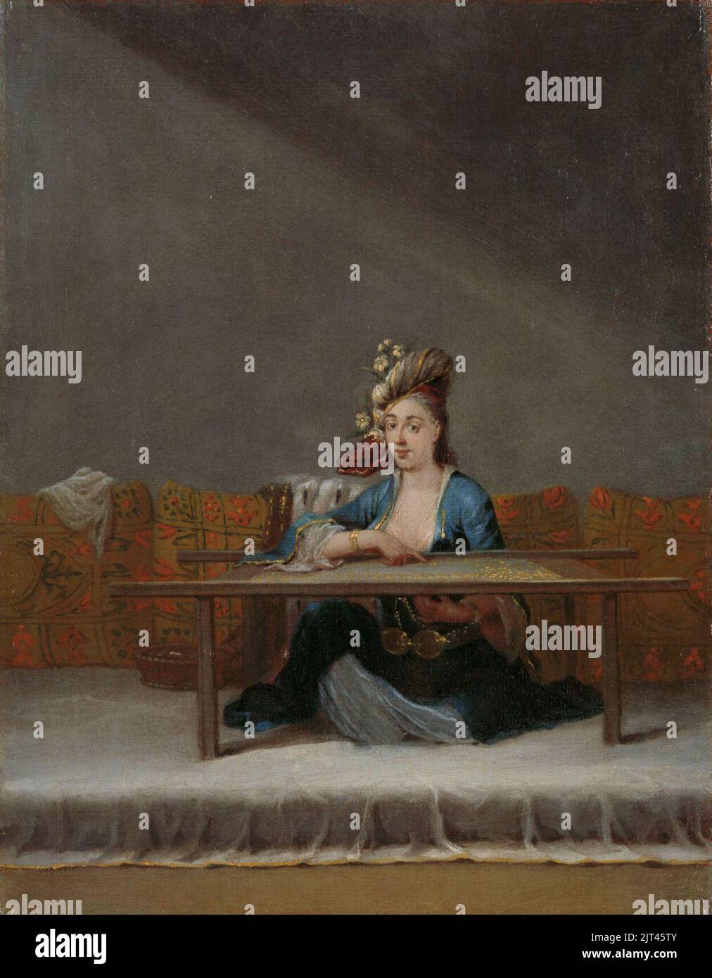 Turkse vrouw voor haar borduurraam Stock Photo - Alamy