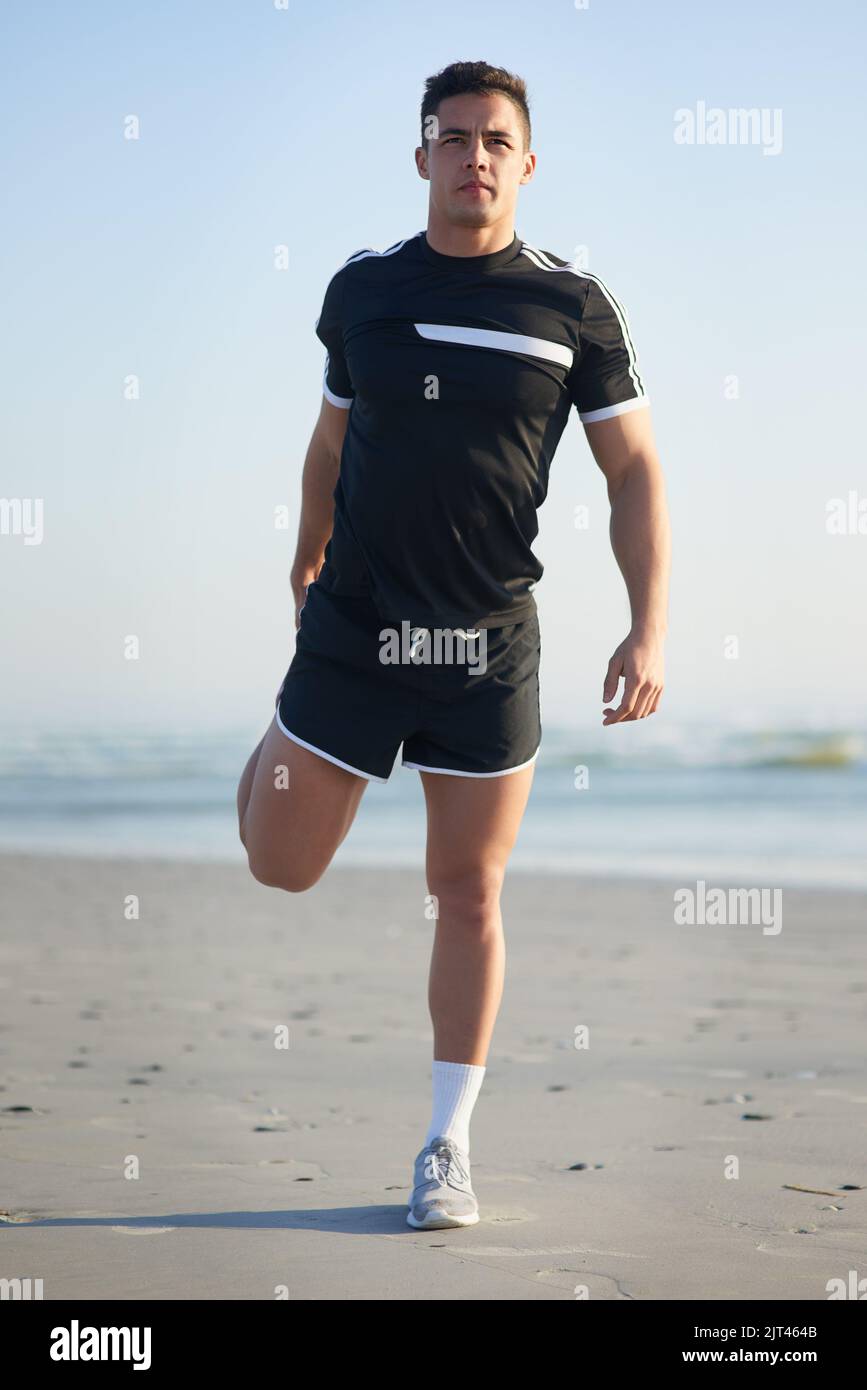 I always start with a warmup. Full length portrait of a handsome young ...