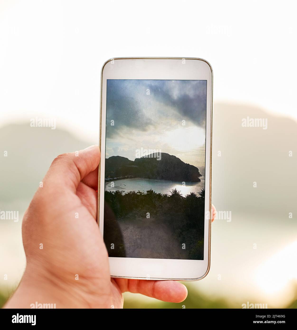 Getting snap happy. an unidentifiable person taking a picture with a ...