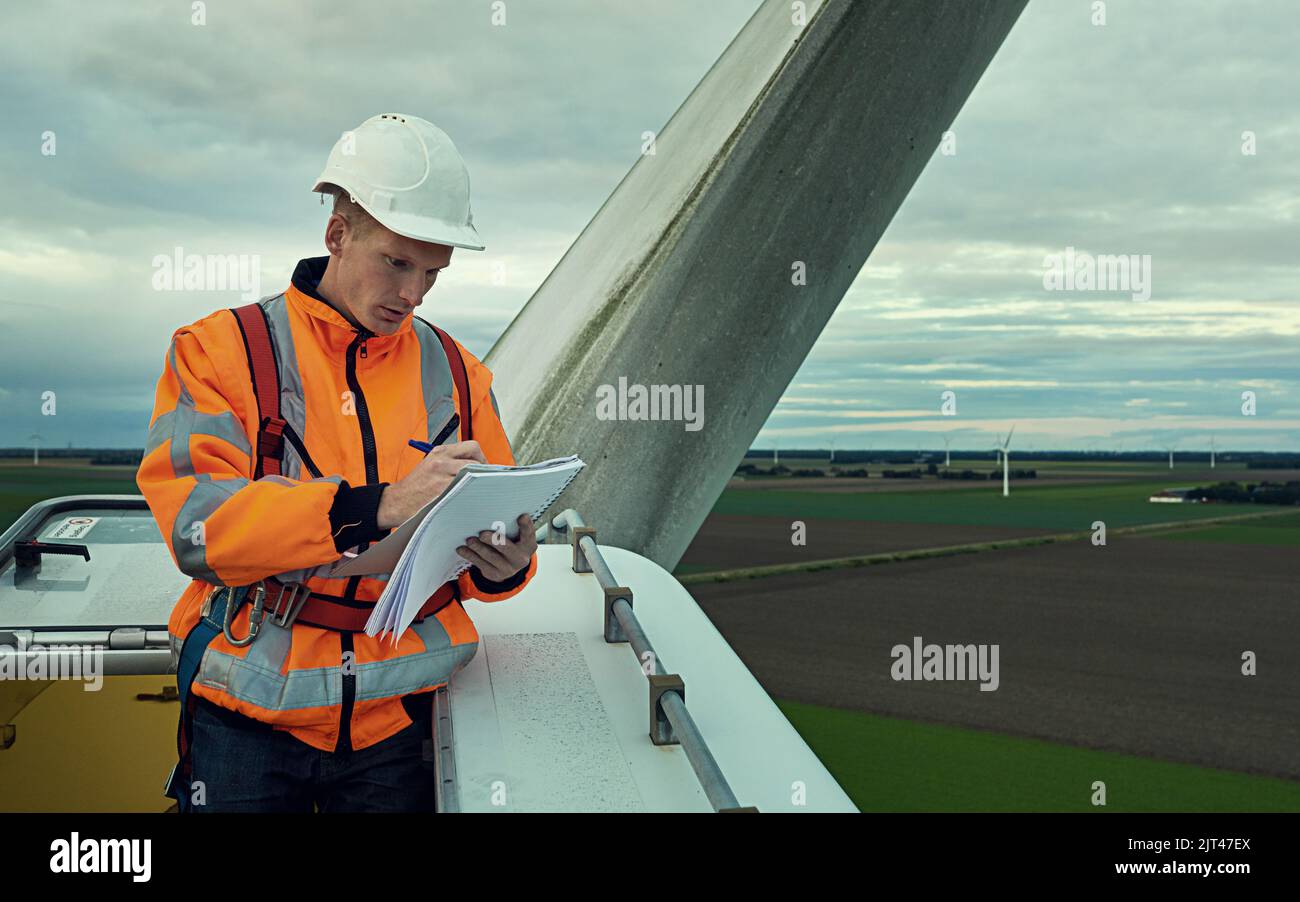 Making sure he has everything on his checklist. a young engineer ...