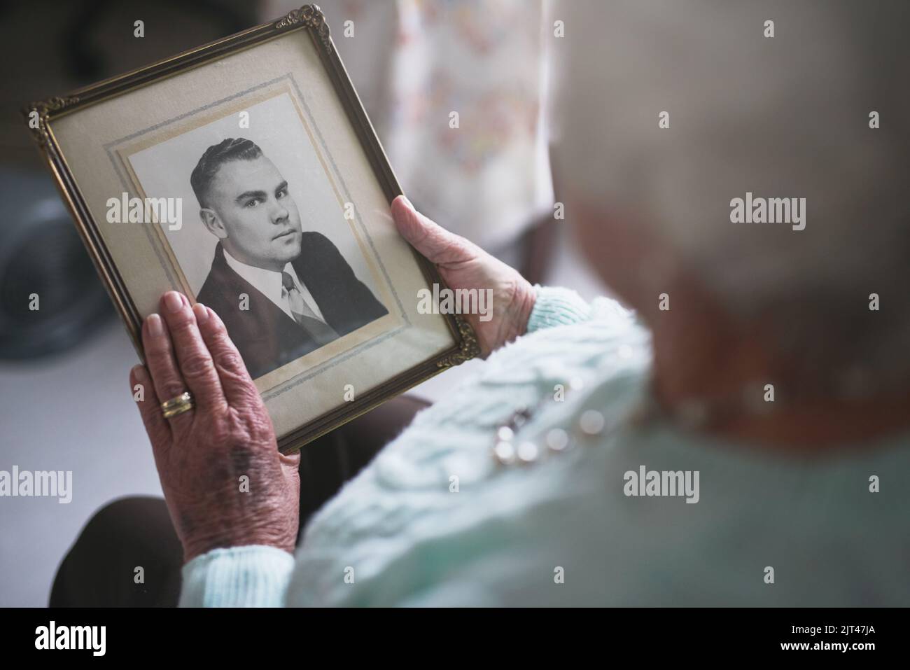 He was such a kind and caring man...a senior woman looking at an old ...