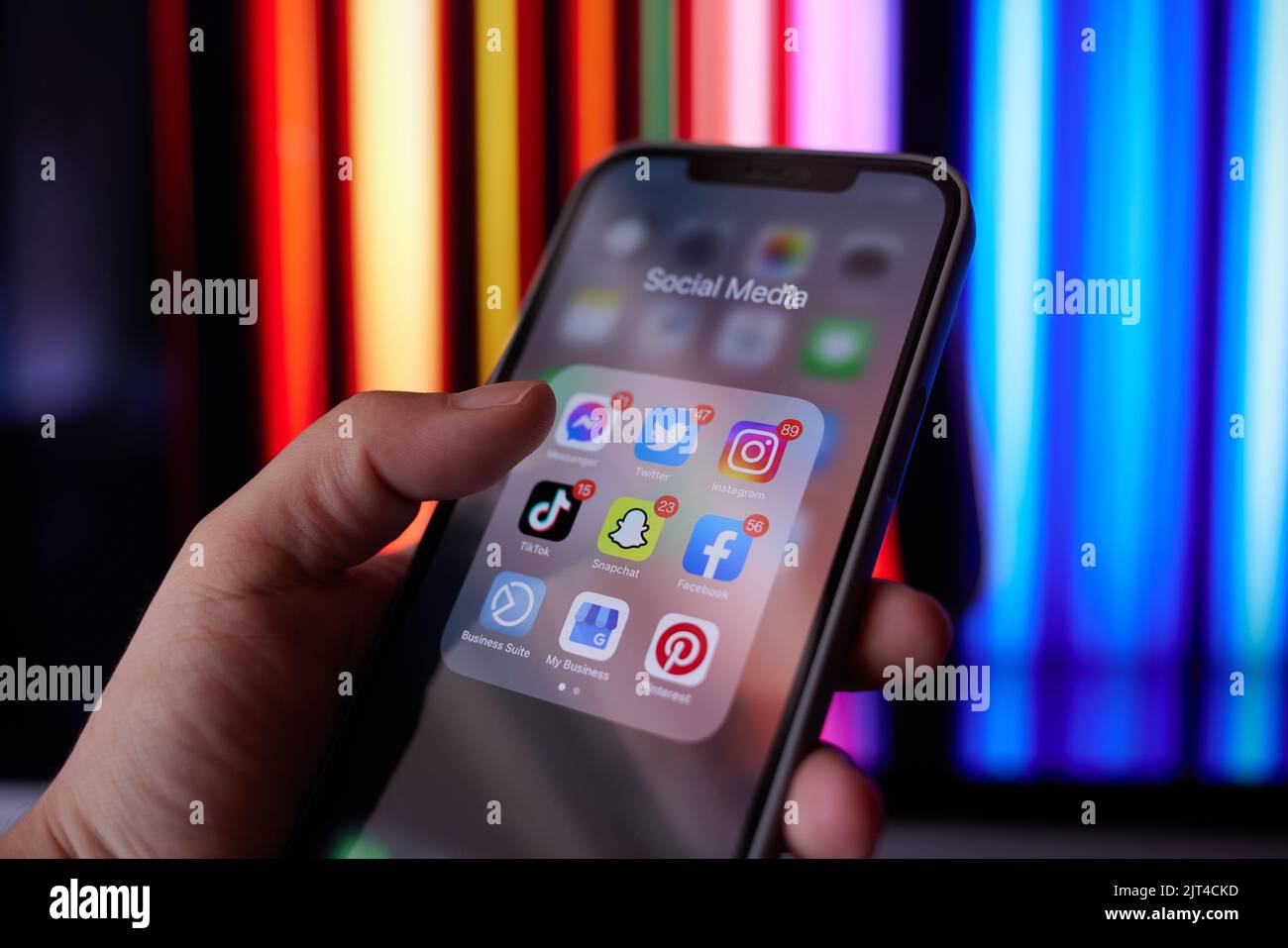 iPhone in Hand on Screen Group of Social Media apps and Notification ...