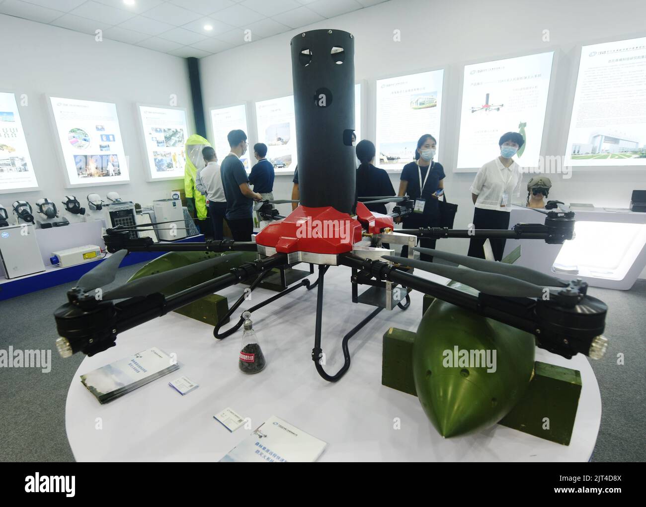 HANGZHOU, CHINA - AUGUST 28, 2022 - Visitors look at a long-range aerial fire-fighting drone ...