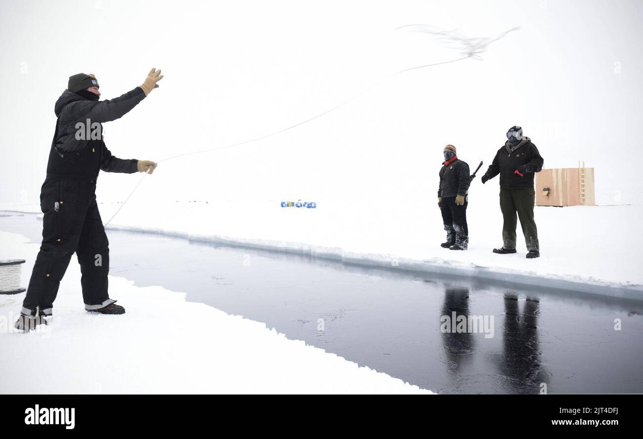 Two ice camp workers are stranded after a break in the ice developed at ...