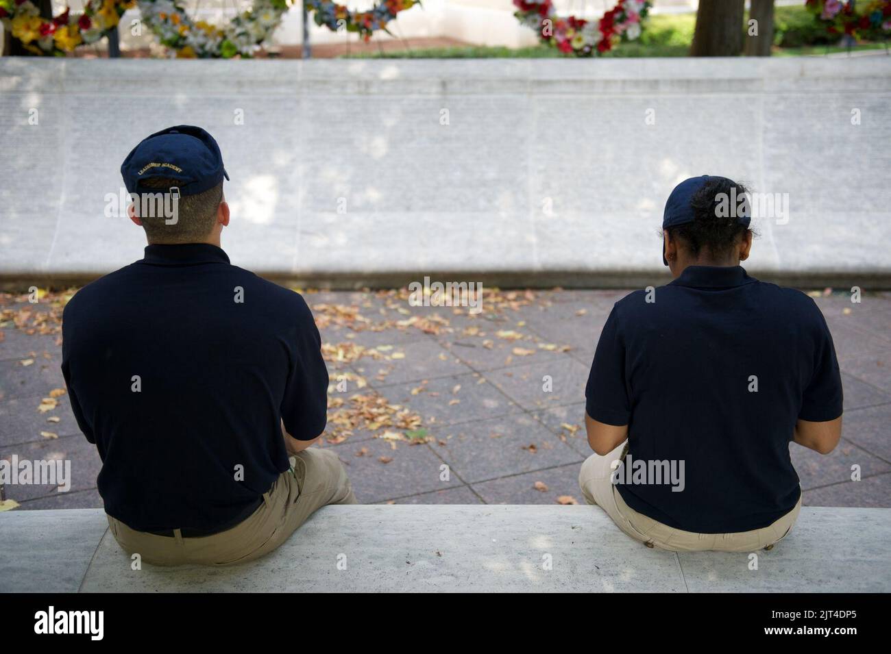 Two law enforcement explorers sitting at the National Law Enforcement ...