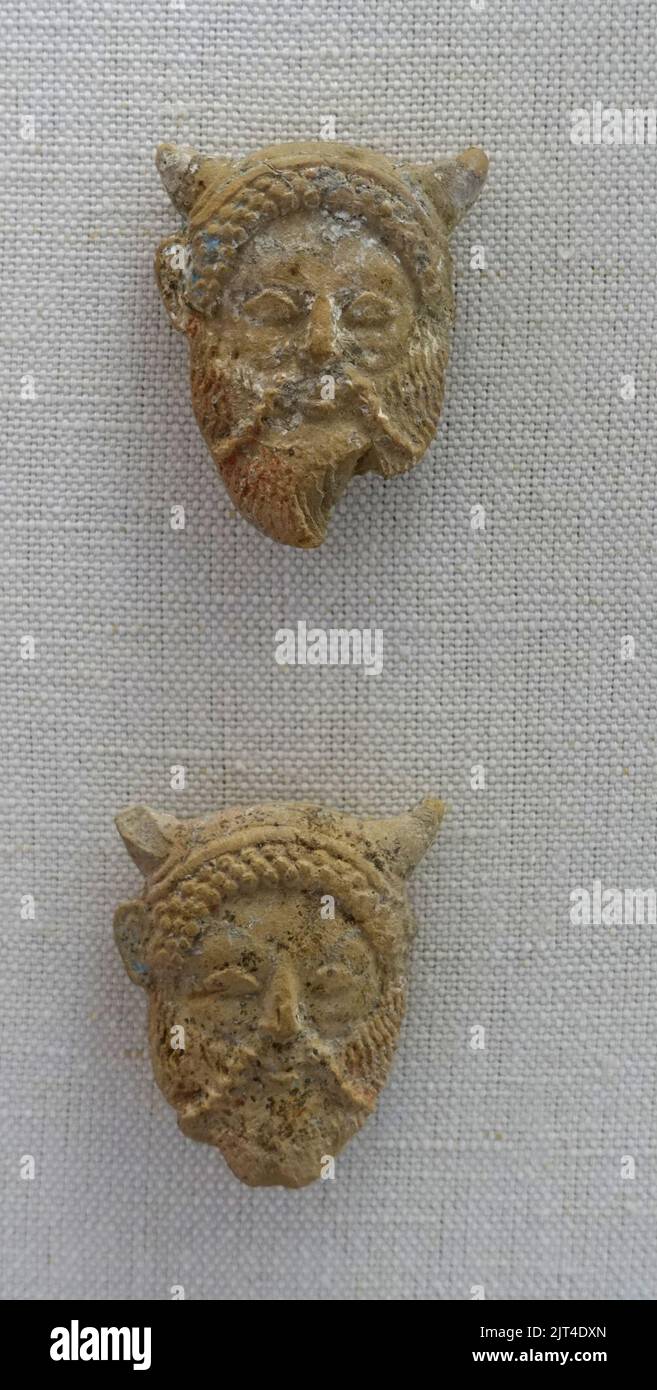 Two masks of Achelous, early 5th century BC, terracotta Stock Photo - Alamy