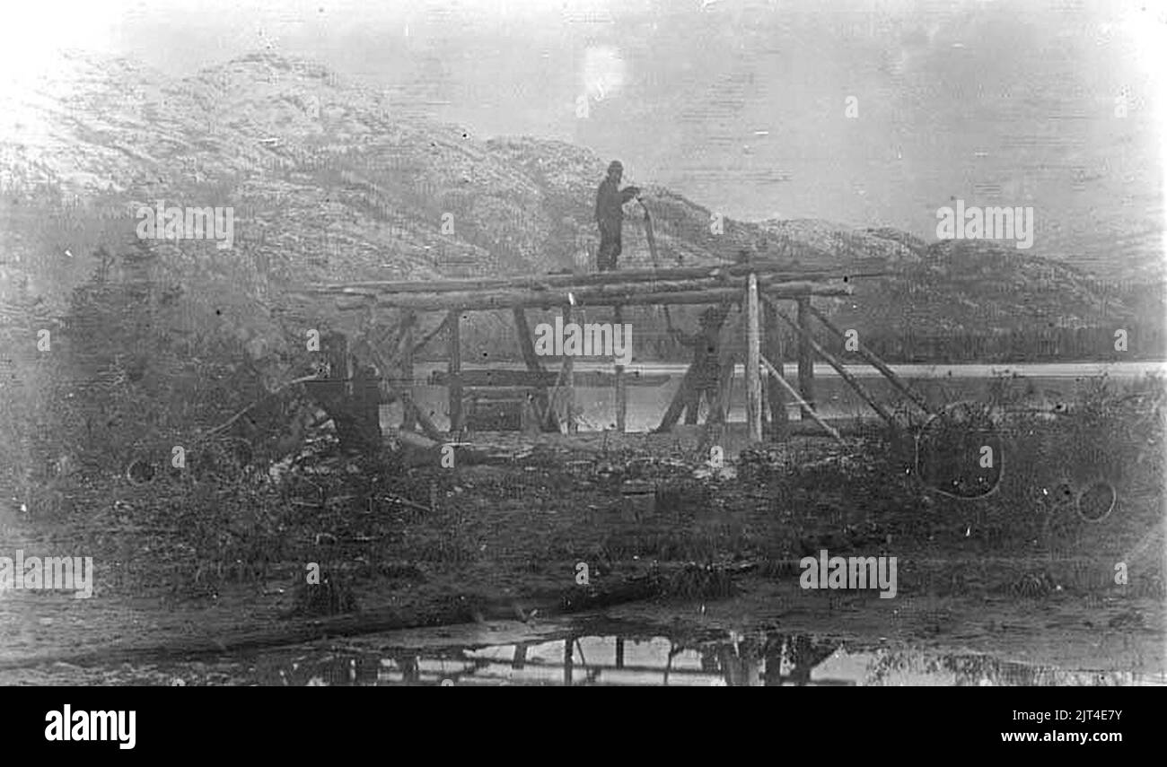 Two men whipsawing lumber at Lindeman Lake, September 26, 1897 (SARVANT ...