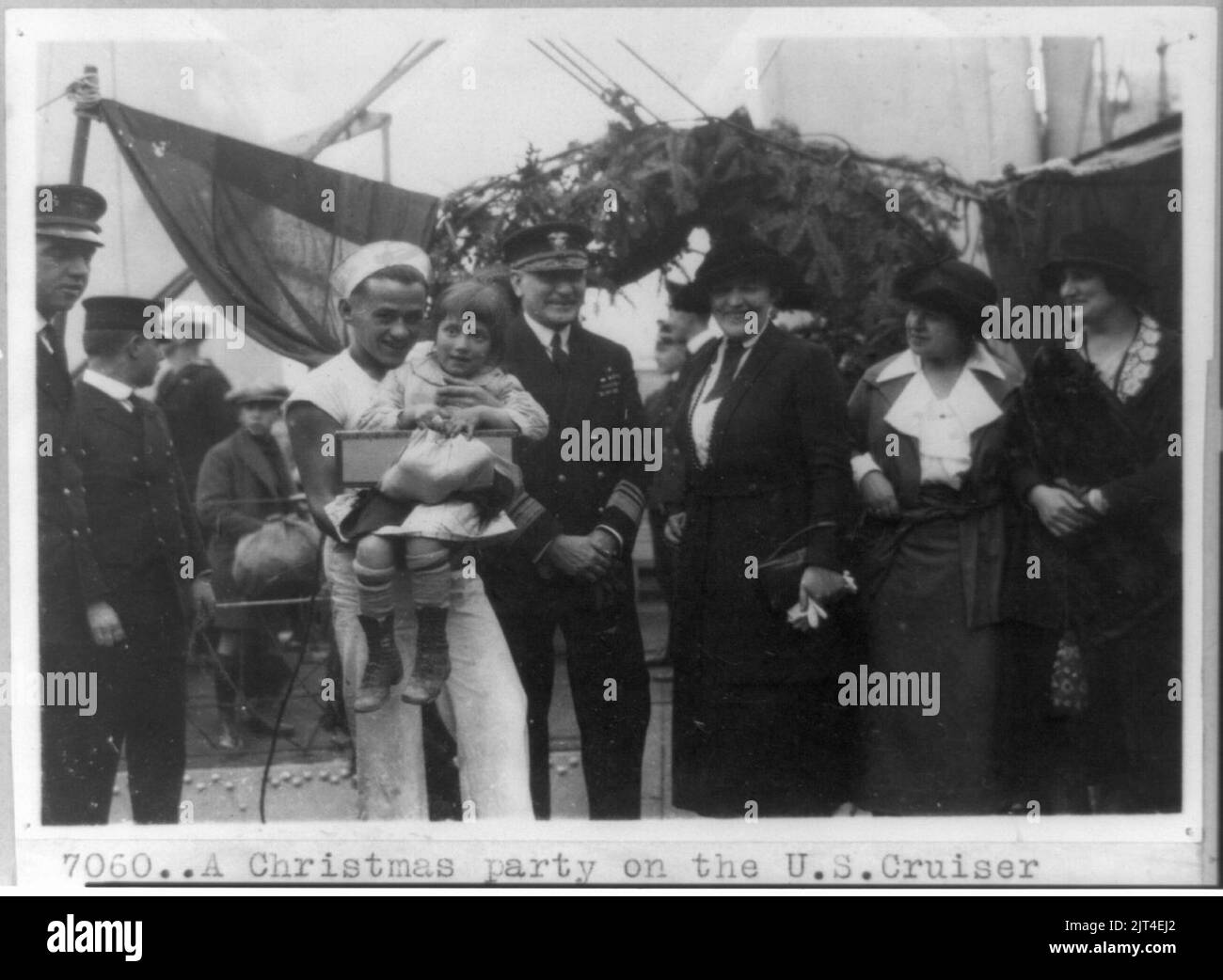 Two orphans with Near East Relief workers and sailors on board the U.S ...