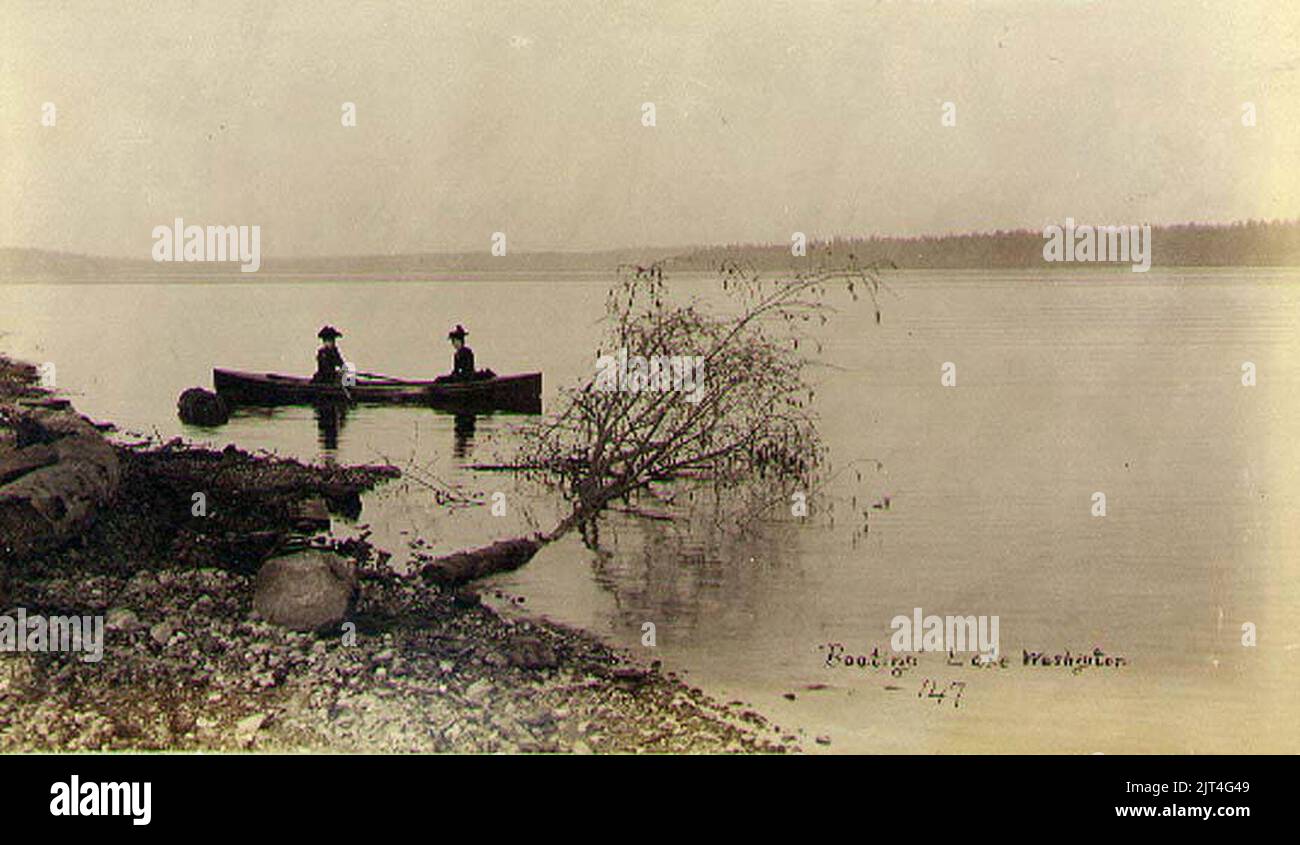 Two women in a rowboat on Lake Washington, probably in the vicinity of ...