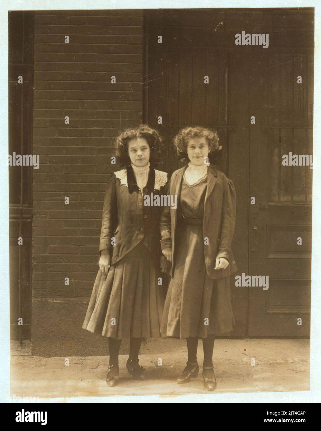 Two young girls working Inland Type Foundry. 9 to 10 hours a day Stock ...