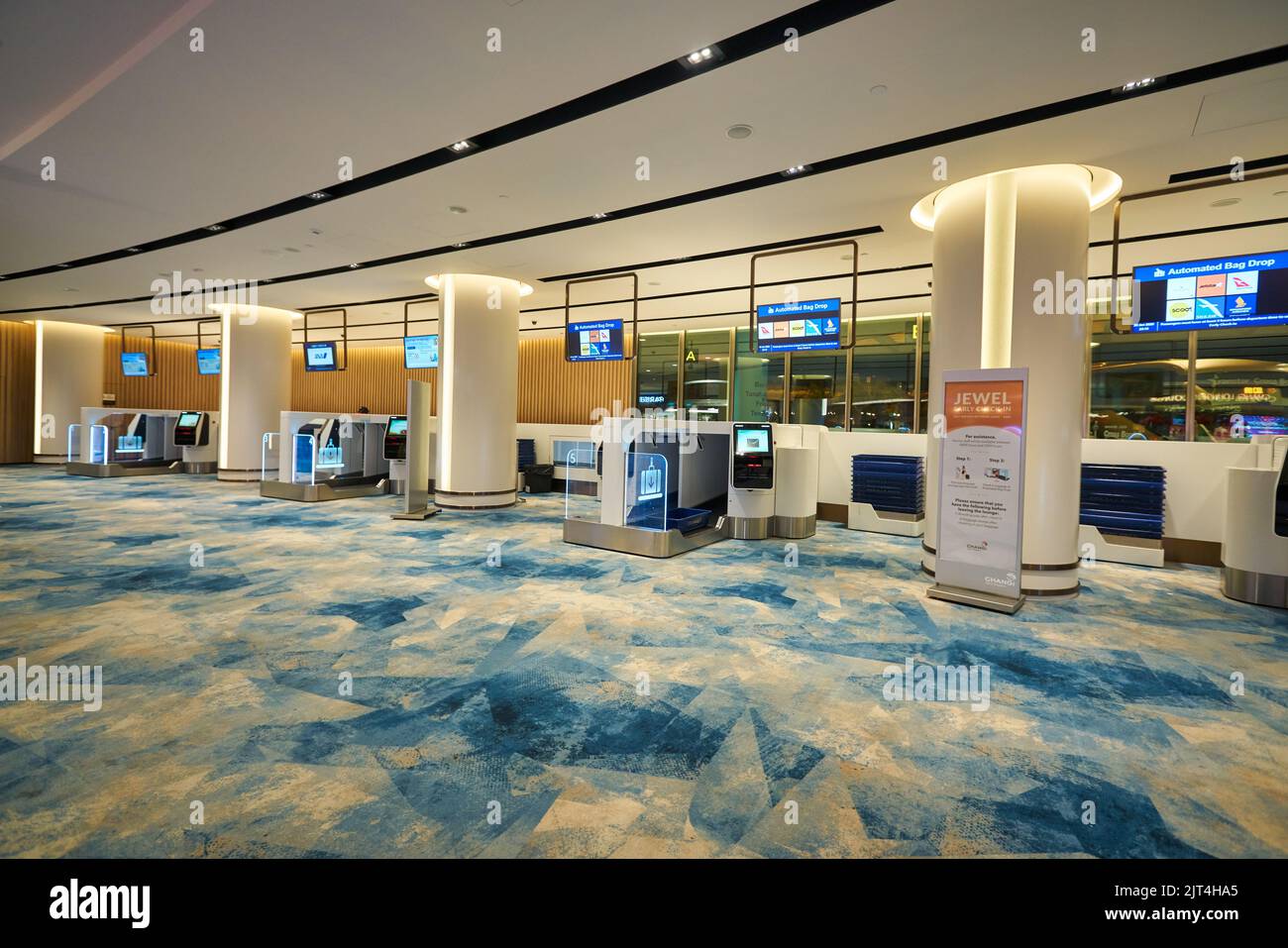 SINGAPORE - CIRCA JANUARY, 2020: automatic early check-in counters and ...