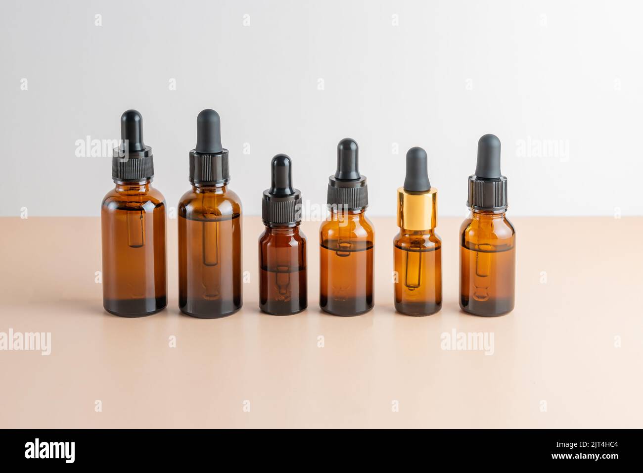 Set of famous dropper bottles with essential oils of beauty face serum ...