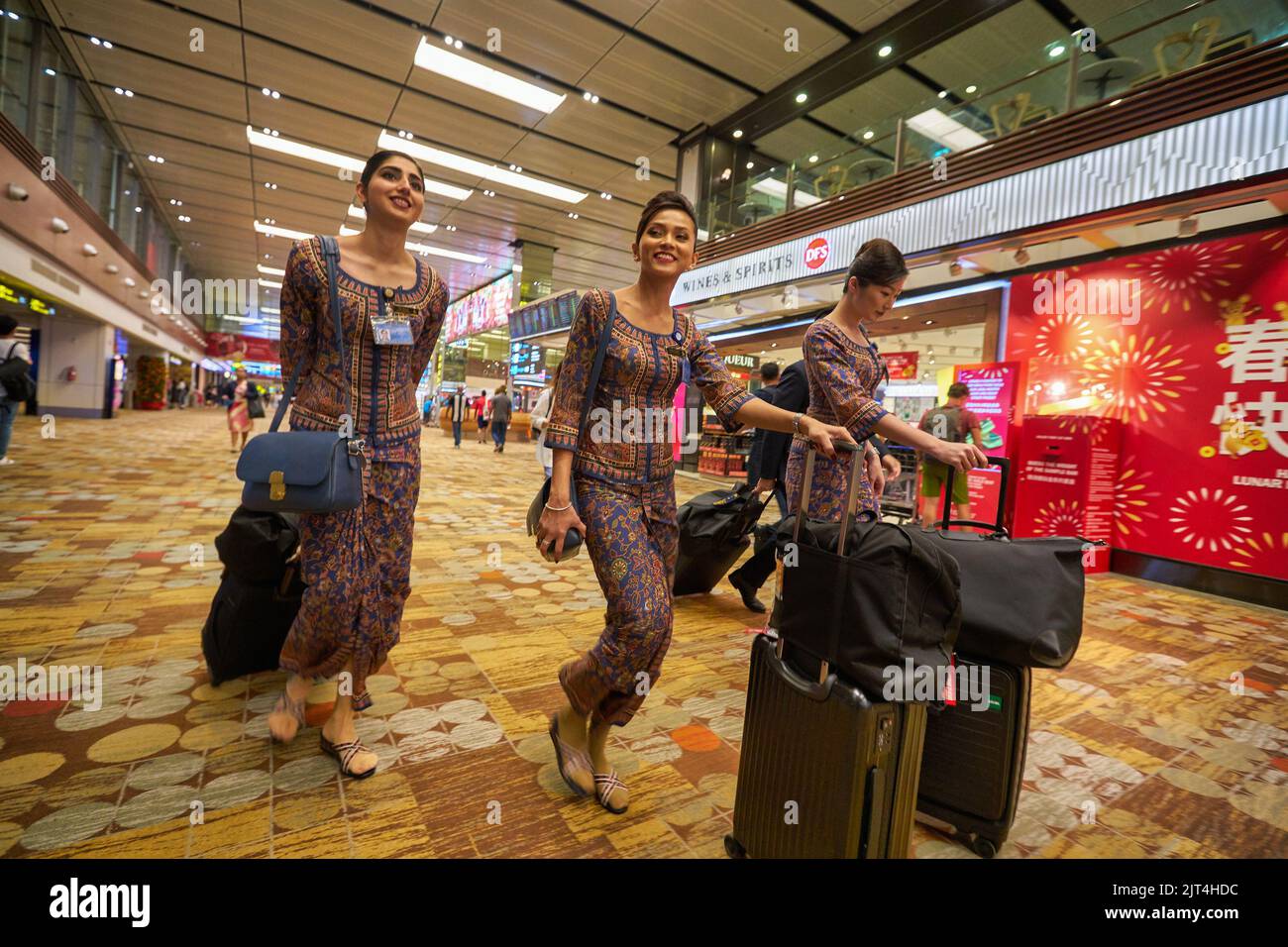SINGAPORE - CIRCA JANUARY, 2020: Singapore Airlines crew members at ...