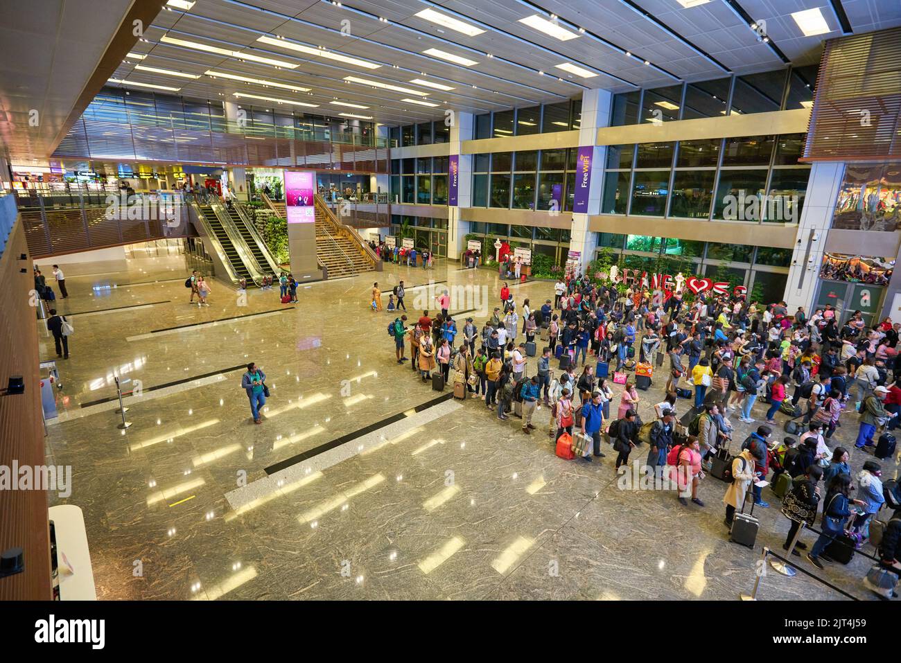 SINGAPORE - CIRCA JANUARY, 2020: above view of crowd of people waiting ...