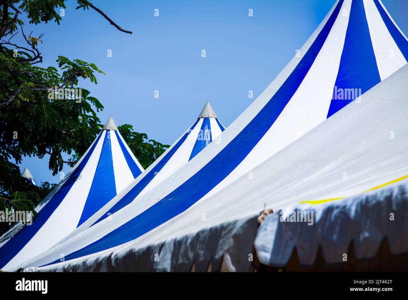 Cone tents erected to house participants. Roof of tents in a fair event ...