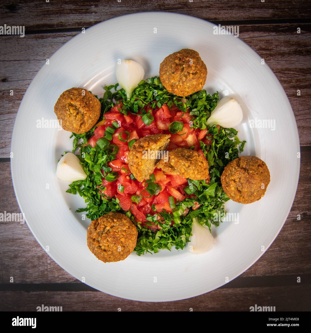 Vegetarian dish, falafel balls from spiced chickpeas with chopped ...