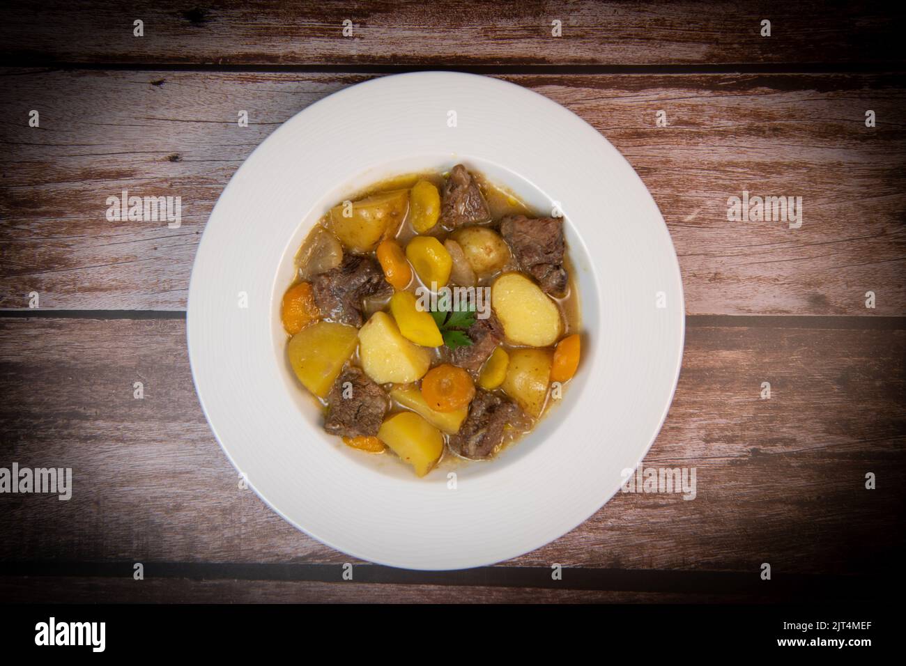 Recipe for beer and mustard beef chuck stew with potatoes, turnips and ...